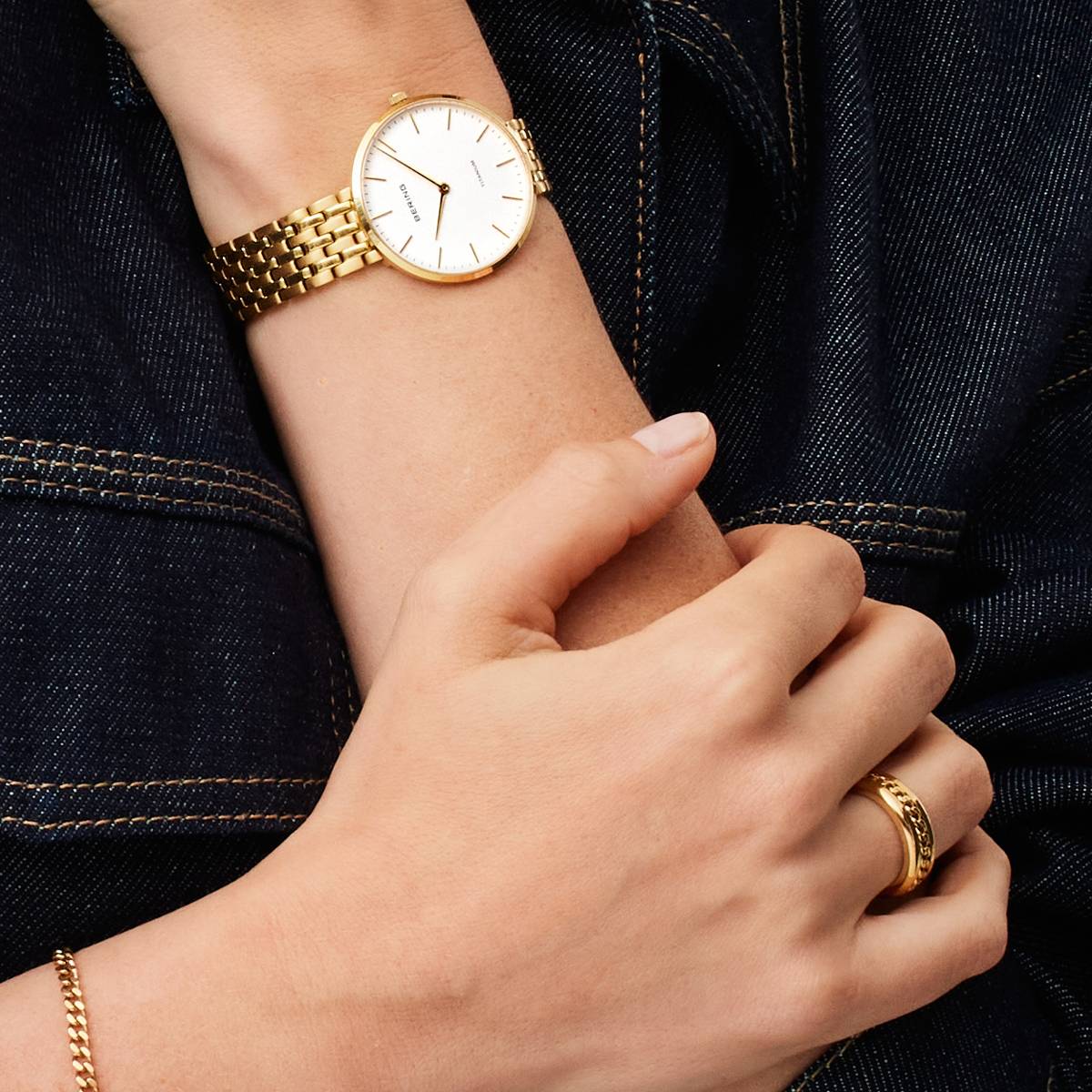 Titanium | polished gold | 19334-334 | BERING ® | Official Website | US ...